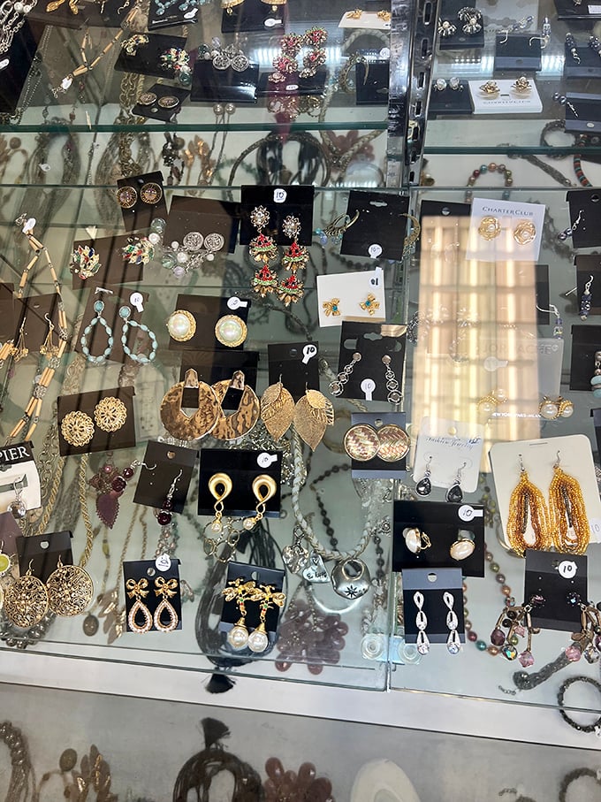 Jewelry that tells a thousand stories – each earring and necklace once adorned someone's special occasion before finding its way to this glittering display case.
