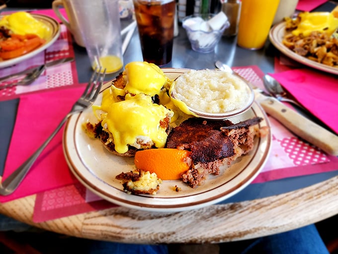 Eggs Benedict that makes you want to write poetry. That sunshine-yellow hollandaise cascading down perfectly poached eggs is breakfast nirvana.