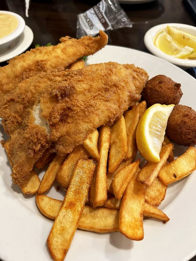 Golden, crispy perfection that would make Neptune himself swim ashore. The fish and chips here aren't just a meal, they're an edible masterpiece.