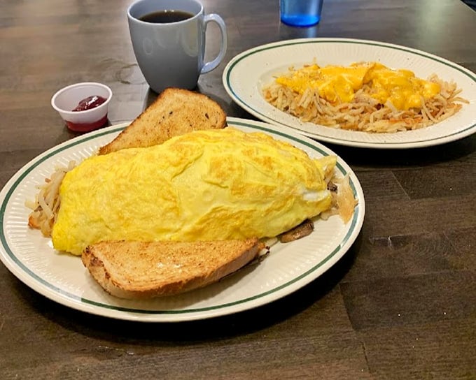 Behold the omelet that launched a thousand satisfied sighs—golden, fluffy, and generous enough to fuel you through corn maze season. 