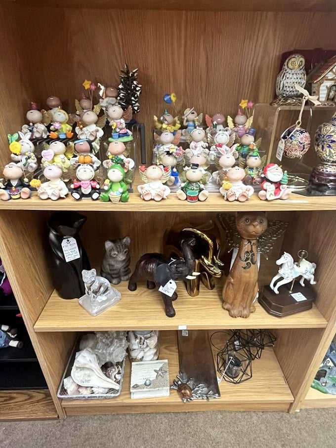 An army of collectible figurines stands at attention, waiting for someone to take them home. That owl looks suspiciously judgmental.