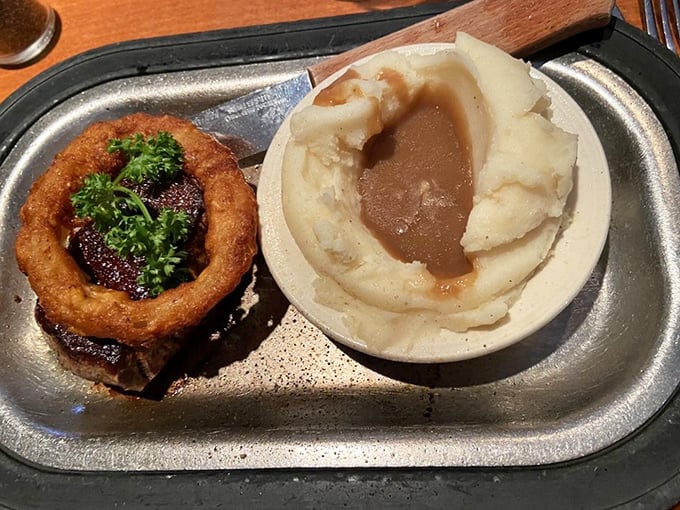 The filet mignon arrives with its trusty sidekick, mashed potatoes. Name a more iconic duo—I'll wait.
