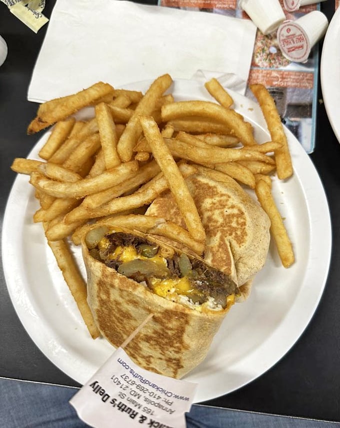 Breakfast wraps should always require this much real estate on a plate. The fries aren't a side—they're a golden, crispy support system.