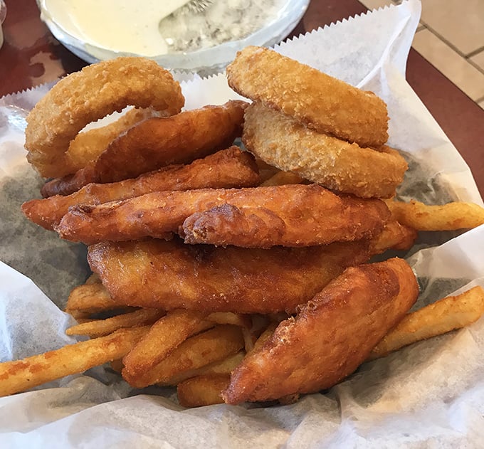 Golden-battered fish and crispy fries nestled in a paper-lined basket – the kind of simple perfection that makes you wonder why you'd ever eat anything else.
