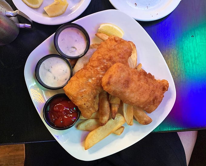 Golden-battered fish and chips arrive with three dipping options – because sometimes life's biggest dilemma should be "tartar sauce or ketchup?"