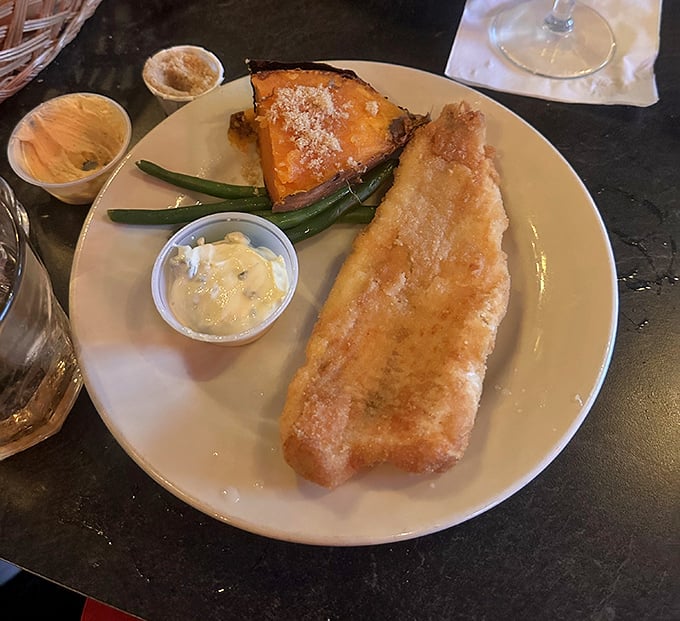 Golden perfection on a plate. This fish fry isn't just dinner—it's the reason calendars were invented with Fridays.