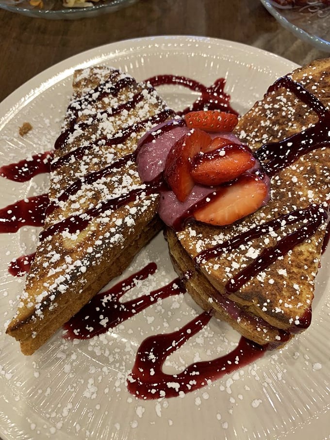 This isn't just French toast—it's a berry-topped masterpiece that makes you question every other breakfast decision you've ever made.