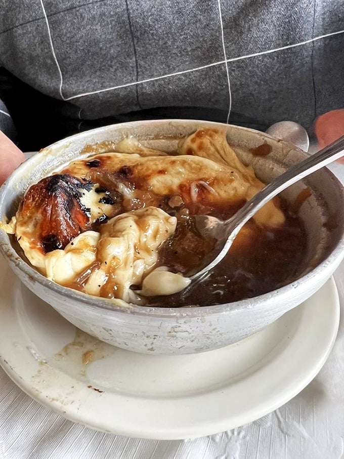 French onion soup that doesn't mess around—the cheese pull alone deserves its own Instagram account.