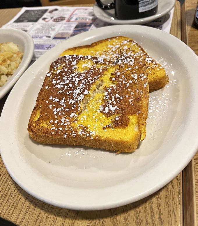 Golden perfection on a plate—their French toast dusted with powdered sugar is simple, unpretentious, and absolutely magnificent.