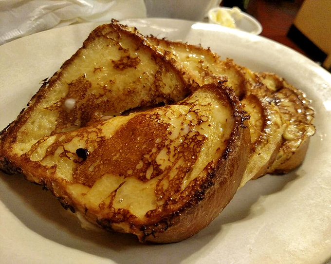 This isn't just French toast—it's a masterclass in breakfast alchemy, transforming humble bread into a golden, custardy revelation.