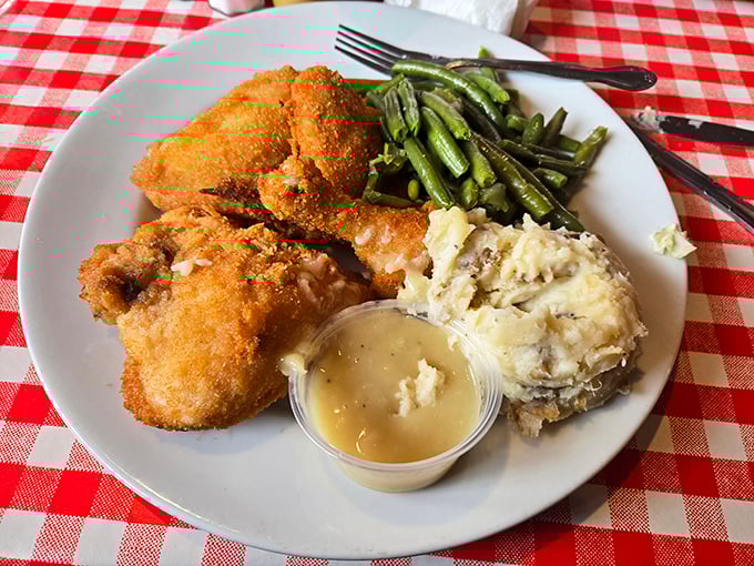 Golden-brown perfection that makes you question every other fried chicken you've ever eaten. The sides aren't afterthoughts – they're worthy companions.