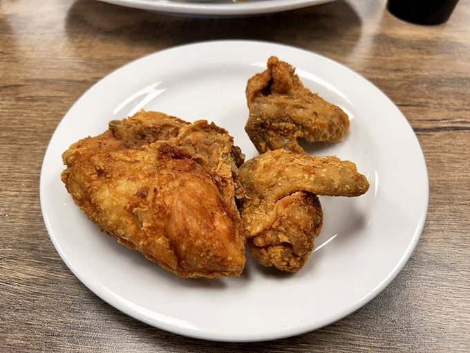 Golden-brown perfection that makes Colonel Sanders look like an amateur. This fried chicken doesn't need fancy packaging—just your undivided attention.