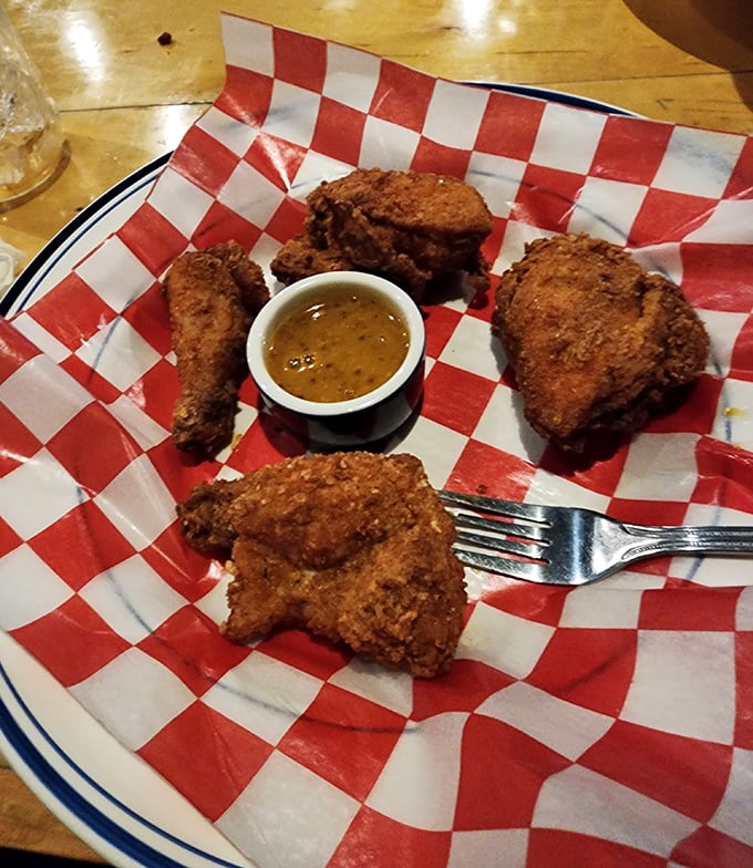 This fried chicken doesn't need a fancy introduction—it speaks fluent delicious with its golden-brown crust and juicy interior. Poetry on a checkered paper.