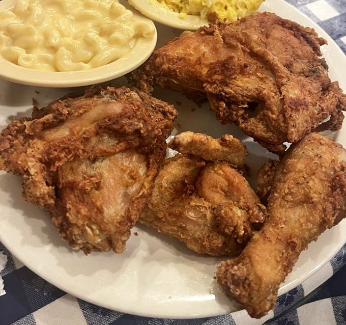 Behold the holy trinity of Southern cooking: golden-brown fried chicken, creamy mac and cheese, and the promise of a nap afterward.