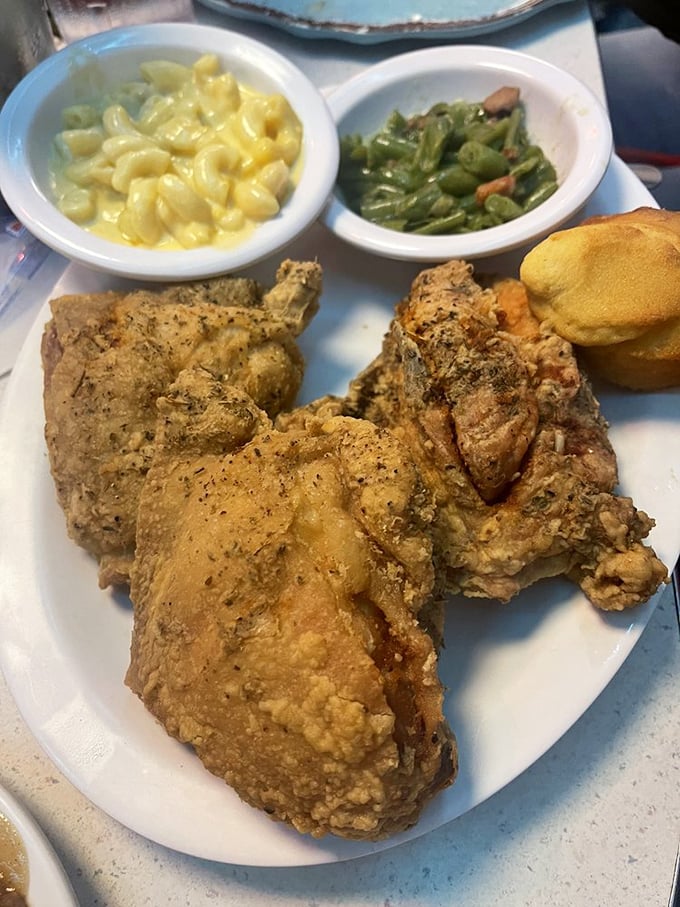 Golden-brown perfection that makes other fried chicken look like amateurs. Those sides of mac and cheese and green beans aren't just playing backup.