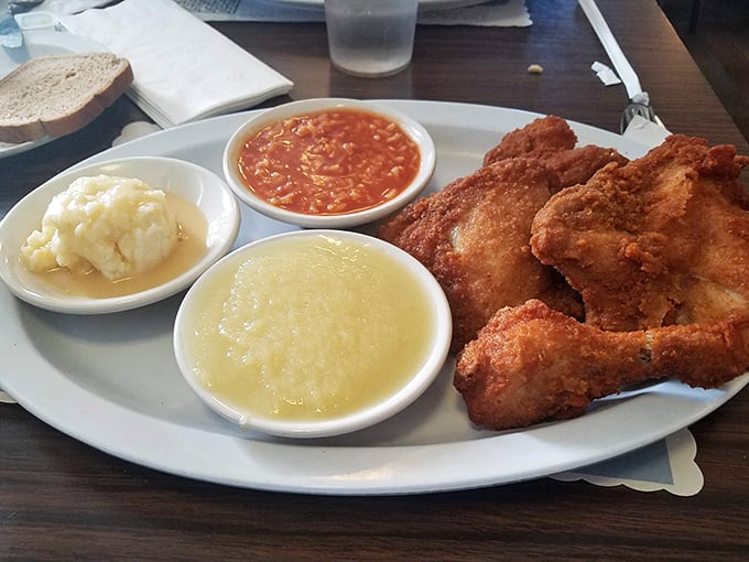Golden-brown perfection with sides that mean business. This plate isn't just a meal; it's a Midwestern handshake in food form.