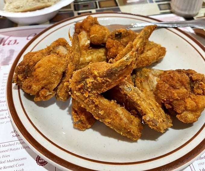 Golden-brown perfection that makes Colonel Sanders look like an amateur. This fried chicken doesn't just talk the talk—it clucks the cluck.