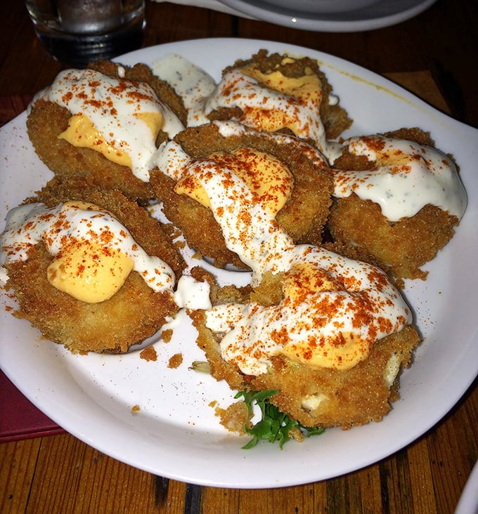 These aren't just fried green tomatoes – they're crispy cornmeal-crusted discs of joy topped with two sauces that'll make you question all other appetizers.