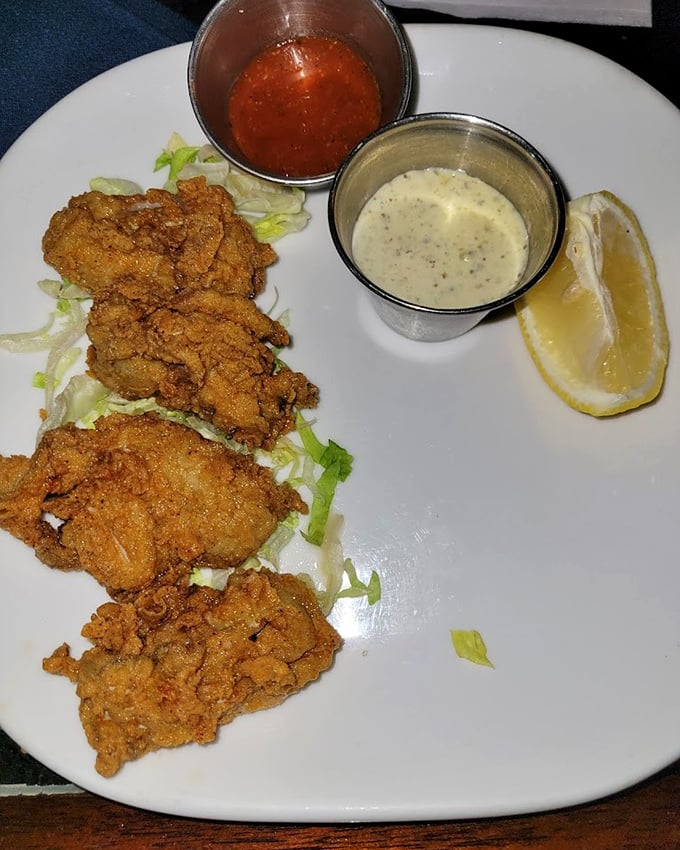 These fried oysters aren't just crispy, they're life-changing—golden-brown perfection with dipping sauces that make you consider drinking them straight.