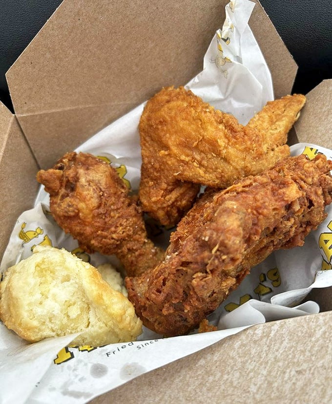Golden-brown perfection that makes you understand why people have religious experiences over properly fried chicken and fluffy biscuits.