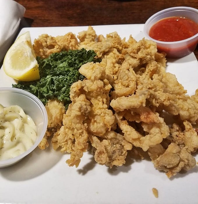 Golden-fried whole belly clams that shatter with each bite—the holy grail of seafood. Worth every mile of your pilgrimage to Easton.