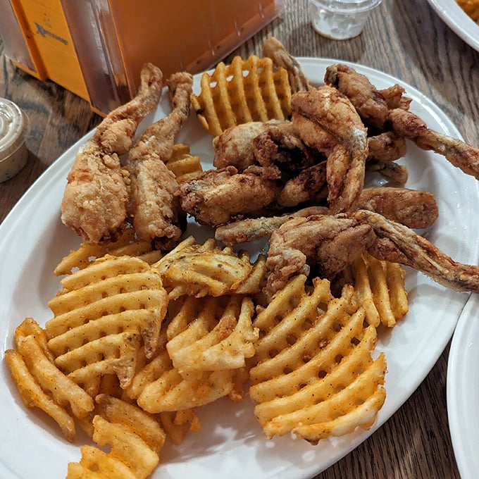 The legendary frog legs! Perfectly golden, crispy outside, tender inside—these amphibious delights are what food pilgrimages are made for.