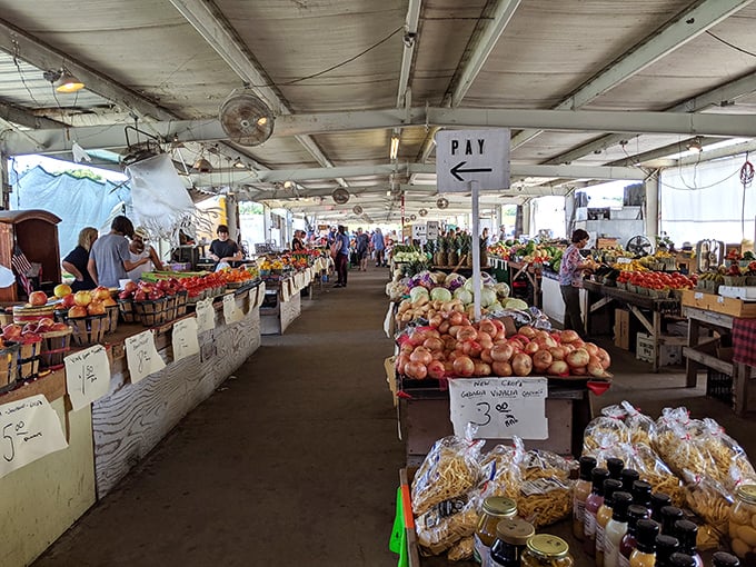 Fresh produce paradise! Apples, peaches, and local harvests create a farmers market within the flea market – nature's candy without the theme park prices.