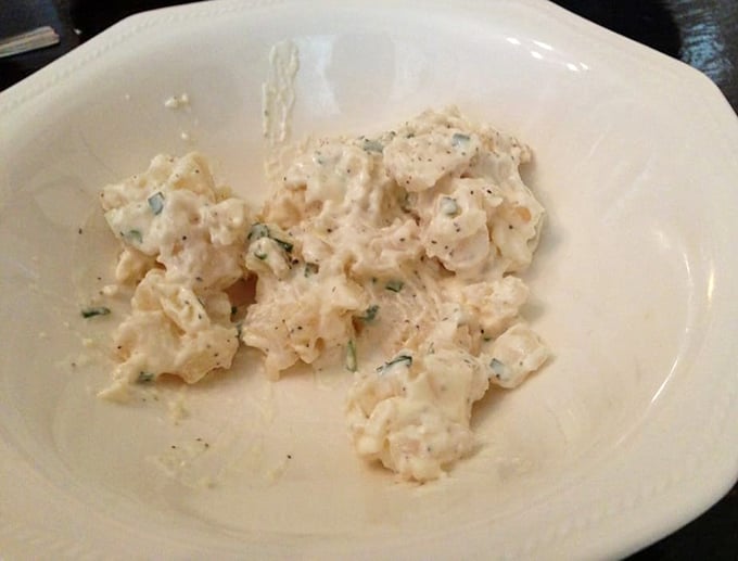 Behold the star of our show! This humble German potato salad might look unassuming, but trust me—it's the side dish that steals the spotlight. 