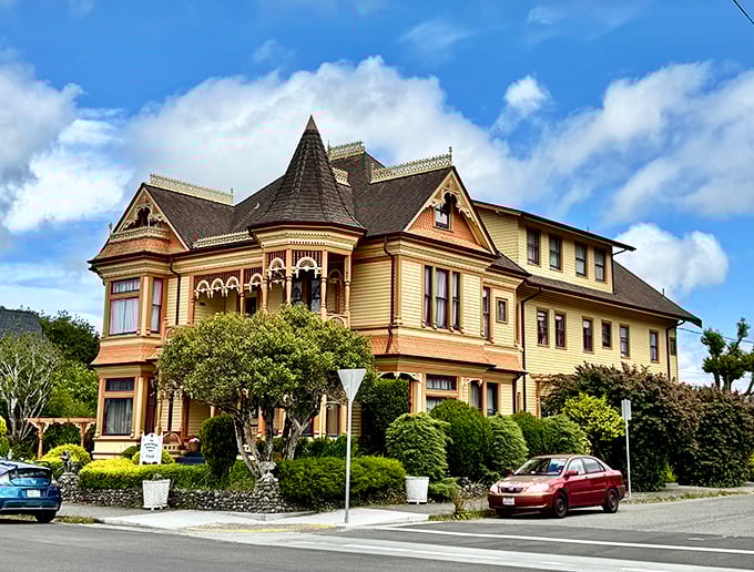 The Gingerbread Mansion isn't just a clever name – it's Victorian architecture on a sugar high, where every decorative detail seems to whisper, "More is more!"