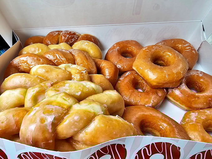 Glazed perfection in its natural habitat. These golden rings of joy aren't just donuts—they're edible halos that make Monday mornings bearable.