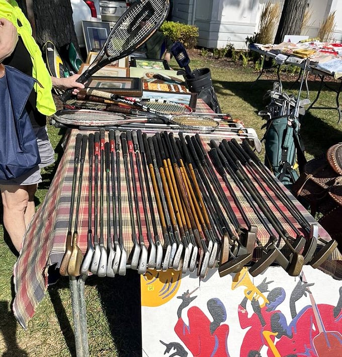 Golf clubs from an era when plaid pants were mandatory and wooden shafts were king. Tennis rackets nearby remember when McEnroe was just getting angry.