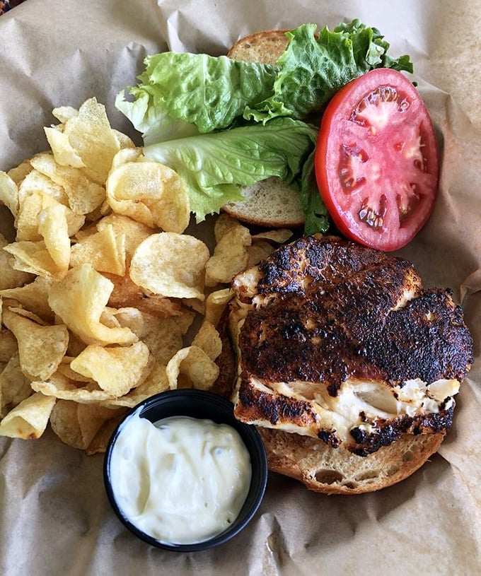 Behold the grouper sandwich that launches a thousand return trips – crispy, flaky perfection between two buns.