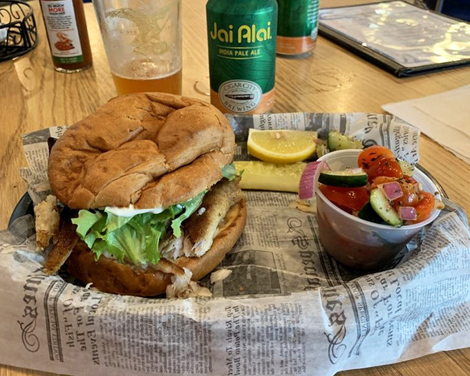 The legendary grouper sandwich arrives like a seafood celebrity – perfectly bronzed, generously portioned, and ready for its close-up. No wonder locals make pilgrimages here.