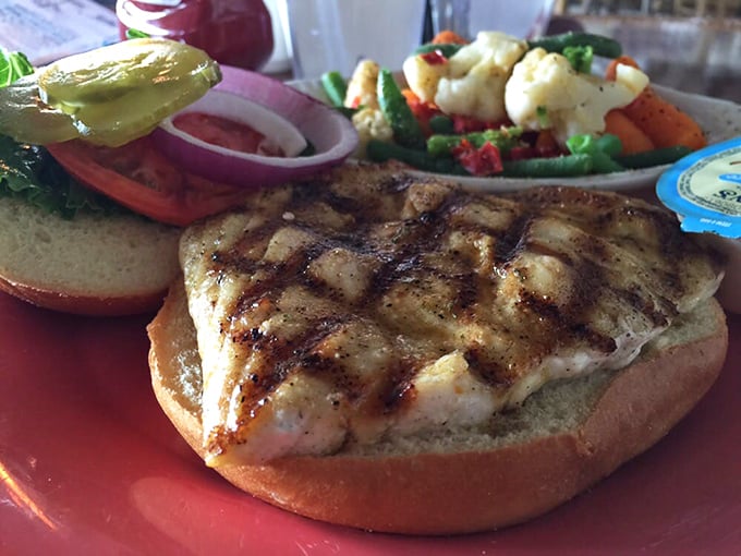 The grouper sandwich in its natural habitat – a perfect specimen of Gulf-to-grill perfection that makes you wonder why you'd ever order anything else.