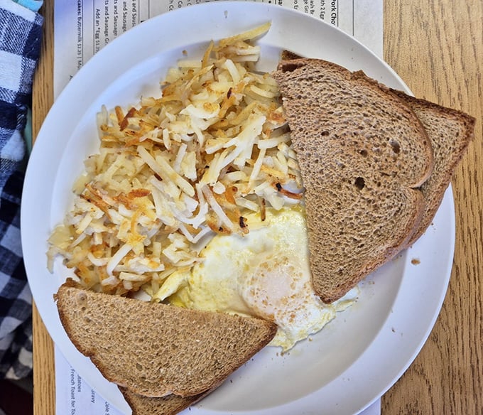 These hash browns achieve that perfect golden-crisp exterior while maintaining a tender interior—a culinary balancing act that deserves its own Olympic medal.