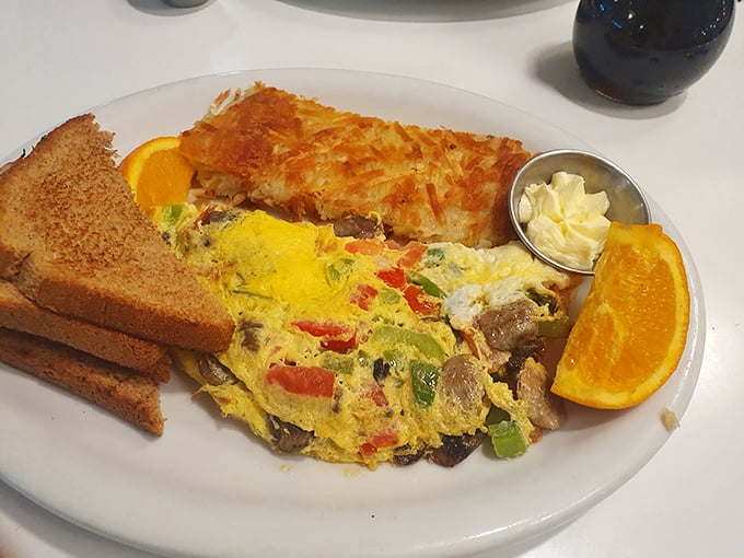 This isn't just breakfast—it's edible architecture. That omelet has more carefully selected ingredients than most people's dating profiles.