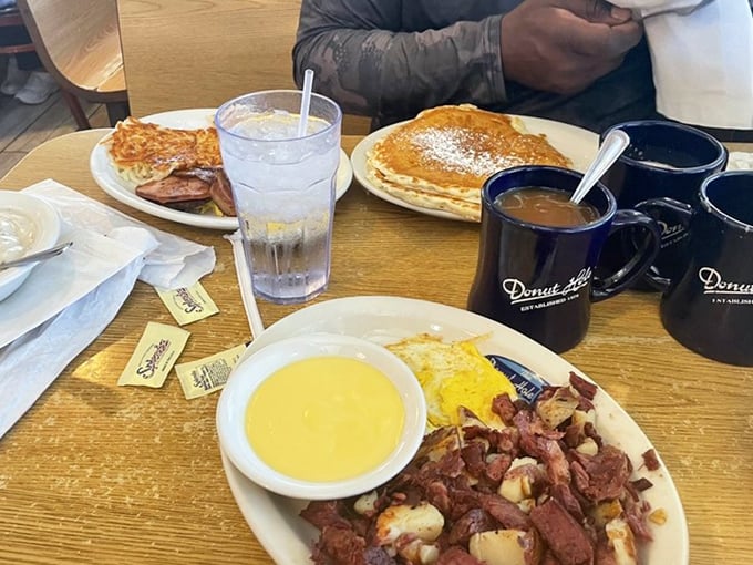 Breakfast platters that would make your grandmother proud. That corned beef hash isn't just food—it's edible nostalgia with a side of grits.