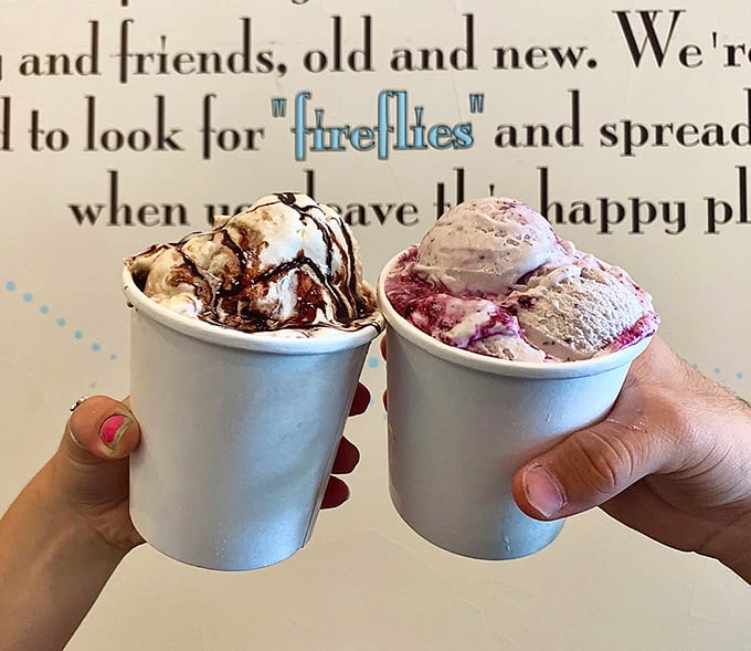 Two cups of frozen perfection ready for their close-up. In Texas summer heat, these aren't just desserts—they're survival tools.
