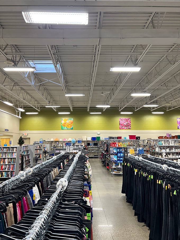 The expansive interior reveals the true scale of this thrifting paradise—high ceilings, bright lights, and endless racks stretching toward the horizon.