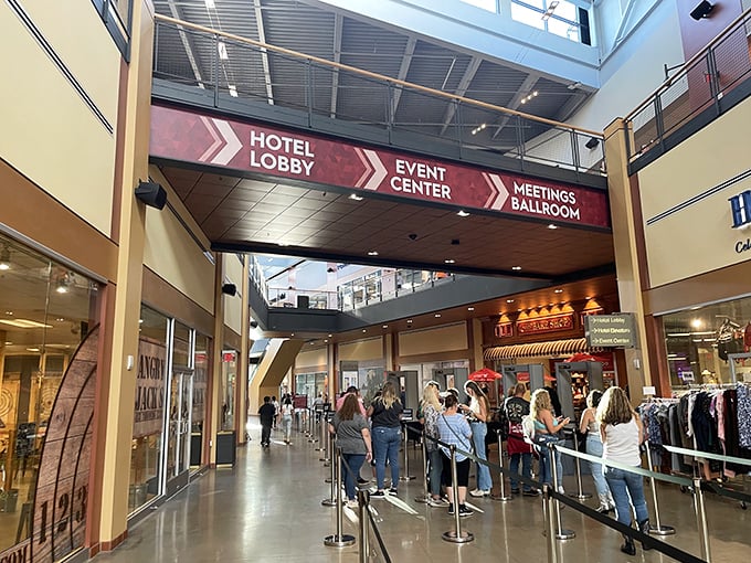 The bustling corridor reveals Wind Creek isn't just shopping—it's a social experience where finding that perfect discounted handbag becomes a communal celebration.