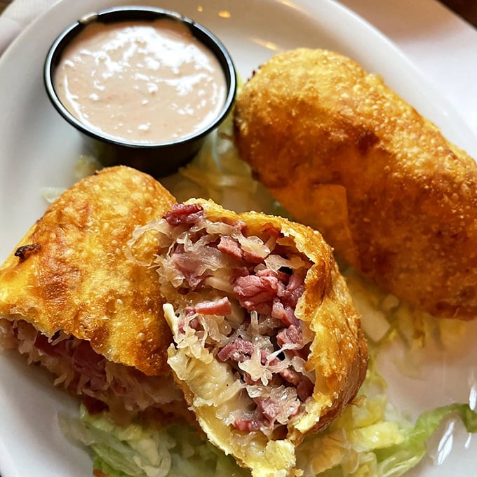 These Irish Egg Rolls are culinary diplomacy at its finest – corned beef, sauerkraut, and Swiss cheese wrapped in crispy wonton perfection.