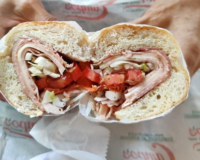 The Italian hoagie – a masterpiece of architectural integrity where layers of meat, cheese, and veggies create a harmony that would make Mozart weep with joy.
