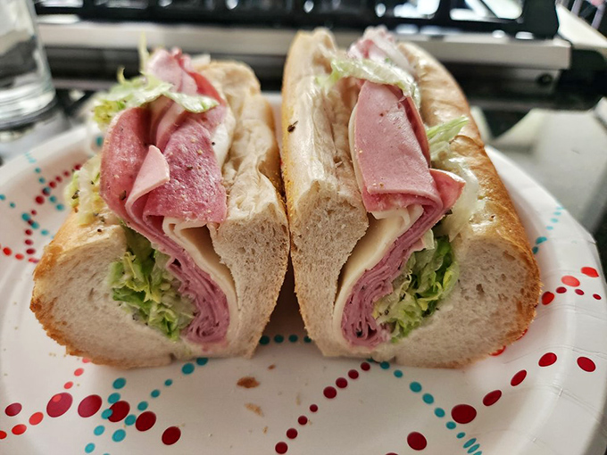 Layers of thinly-sliced perfection nestled in crusty bread—this isn't just lunch, it's an edible art form that's converted sandwich skeptics for generations.