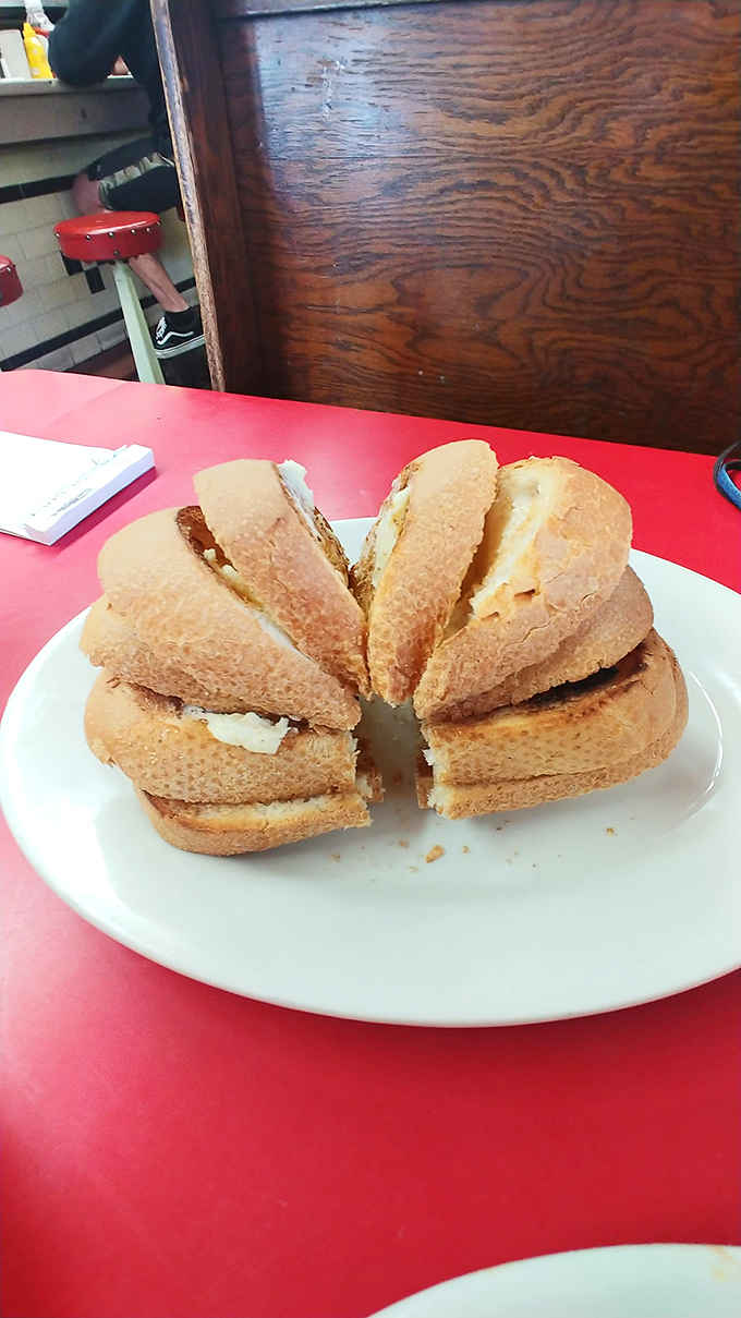 Perfectly golden toast arranged like a sunburst on the plate – simple food done right is Boulevard's philosophy, where basics become extraordinary.