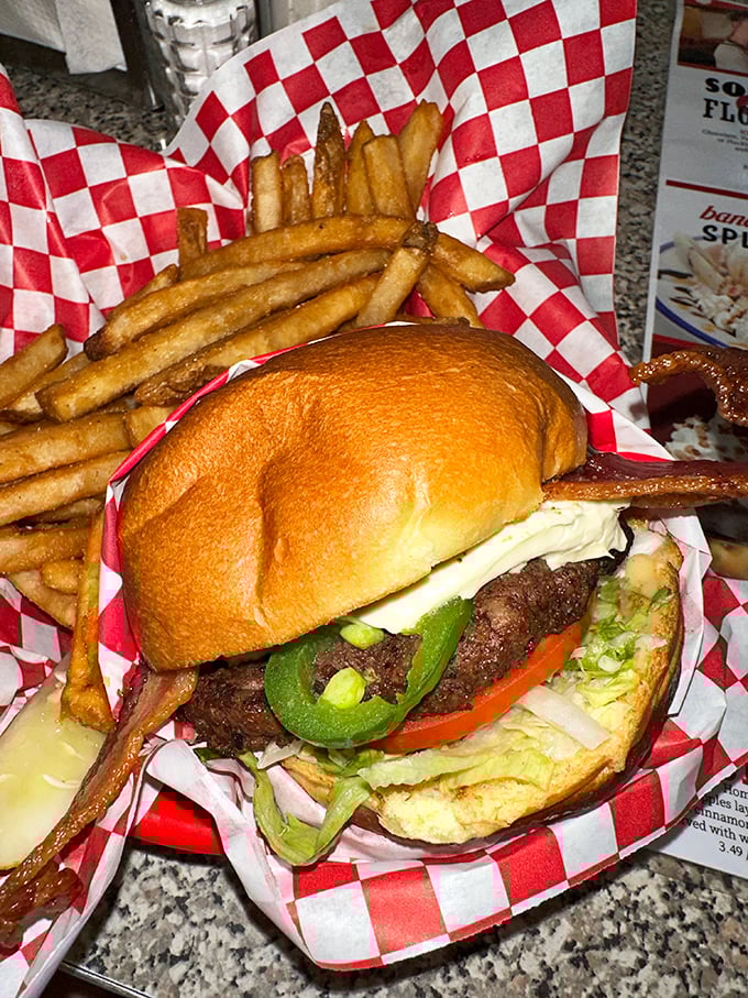The legendary jalapeño burger in all its glory—where fresh peppers meet juicy beef in a relationship that's spicy, satisfying, and worth every napkin.