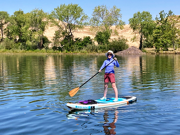 Paddleboarding on Oroville's crystal waters – where the biggest decision of the day is whether to paddle left or right. Spoiler alert: both choices are winners.