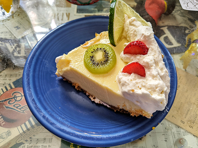That key lime pie slice could make a grown person weep tears of citrusy joy – pure Florida sunshine on a plate.