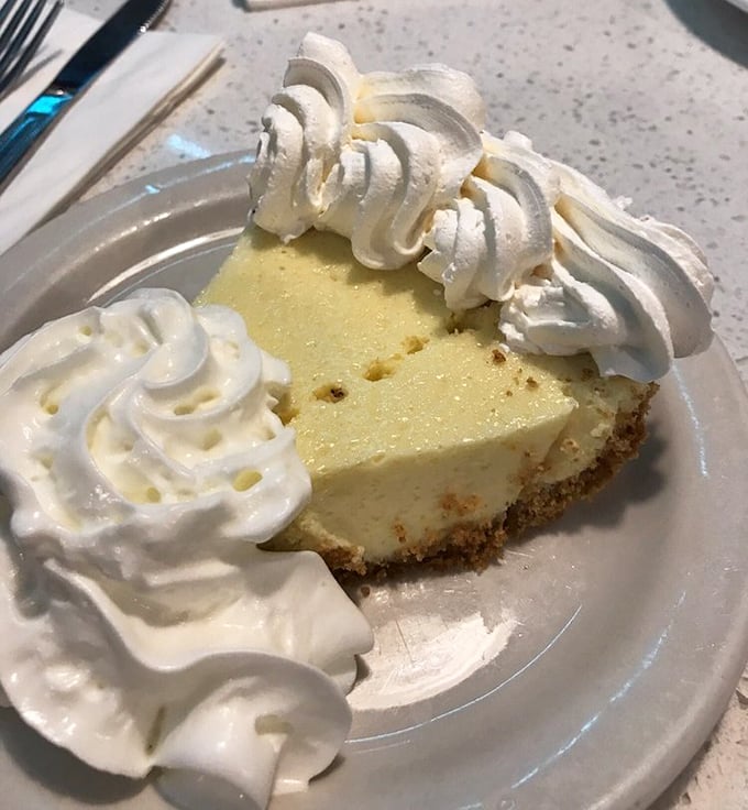 The key lime pie doesn't whisper "Florida"—it belts it out like Jimmy Buffett at a sold-out concert, creamy and tart with a perfect graham cracker foundation.