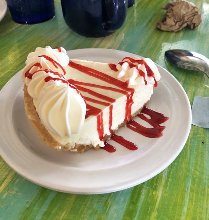 This key lime pie doesn't need a passport photo—it's authentically Keys with that perfect balance of sweet and tart that makes your taste buds do the cha-cha.