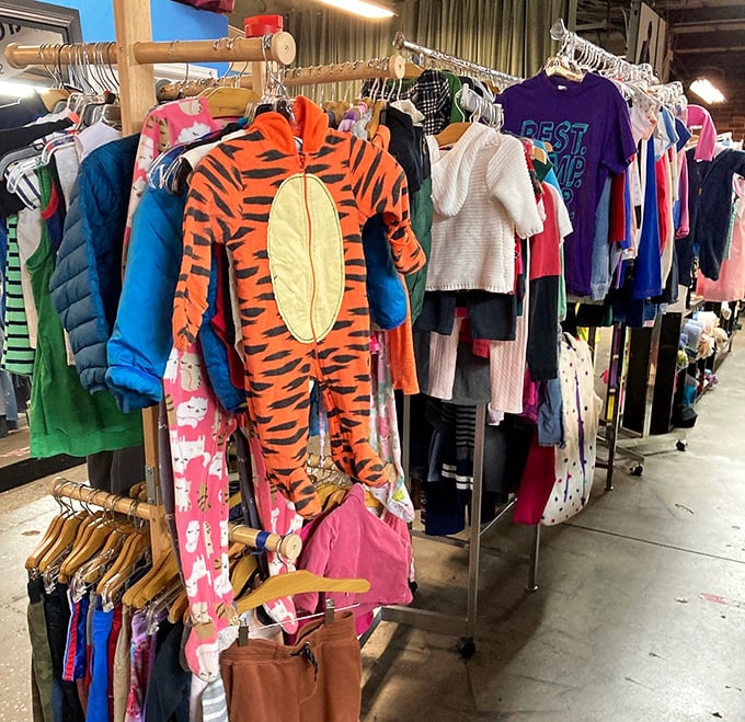 That tiger onesie is practically begging to come home with someone. Kids' clothing section: where tomorrow's Halloween costumes and dress-up trunks are born.